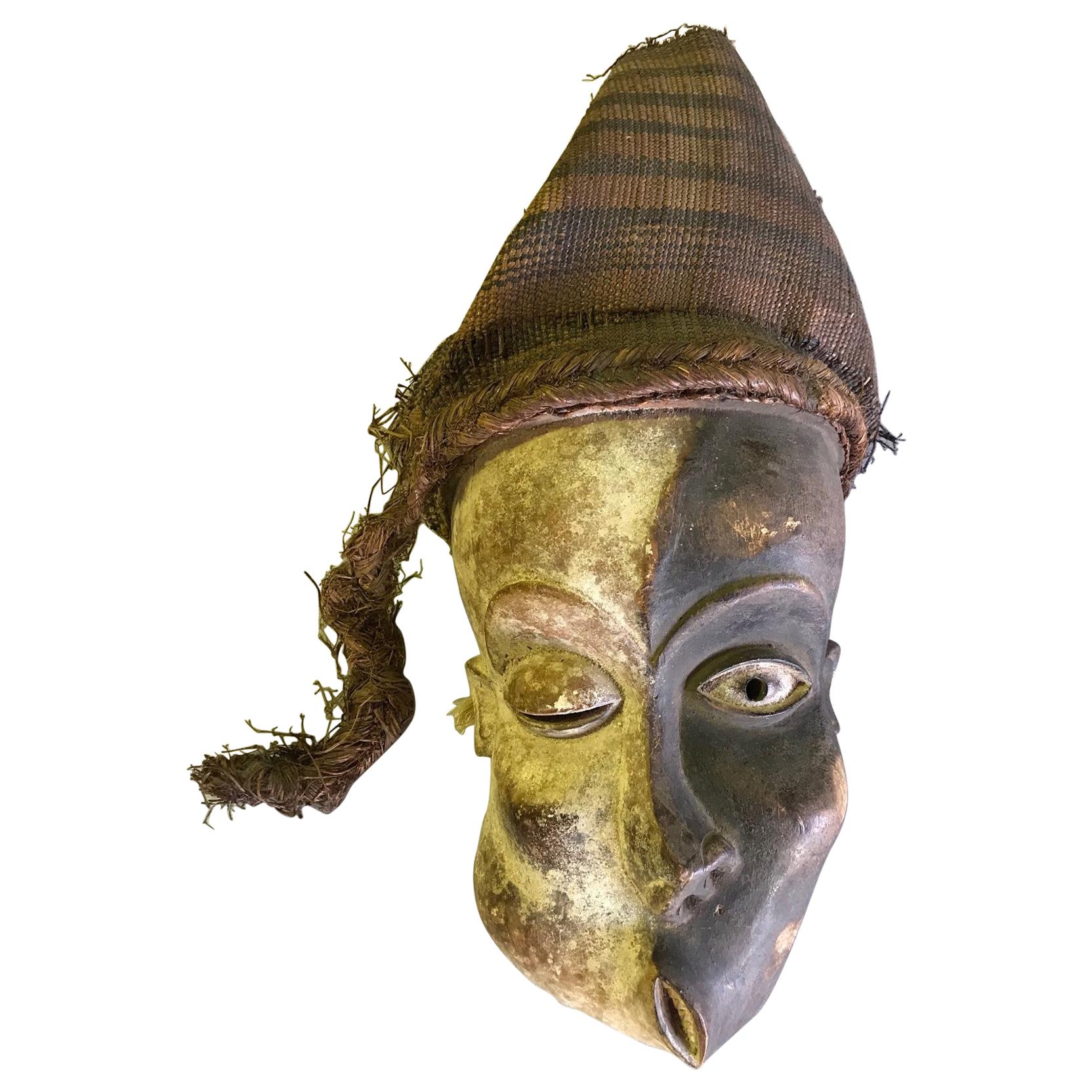 African Pende Tribe Mbangu Asymmetrical Carved Mask For Sale at 1stDibs