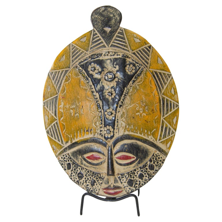 African Wood Decorative Mask Mounted on a Metal Stand For Sale at 1stDibs