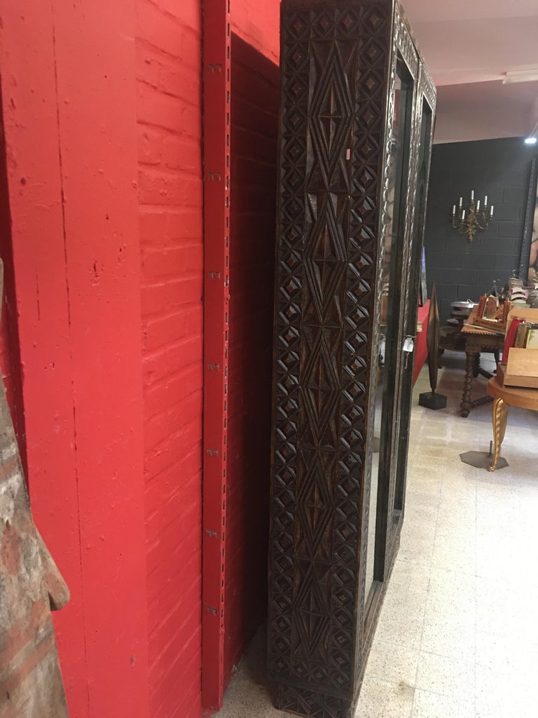 Africanist Showcase Cabinet in Carved Wood, circa 1950 at 1stDibs