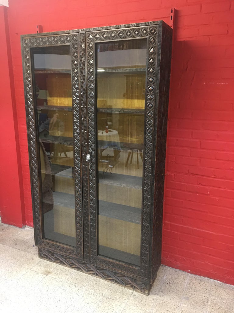Africanist Showcase Cabinet in Carved Wood, circa 1950 at 1stDibs