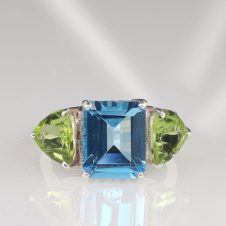 AJD Dinner Ring Featuring Blue Topaz and Green Peridot at 1stDibs