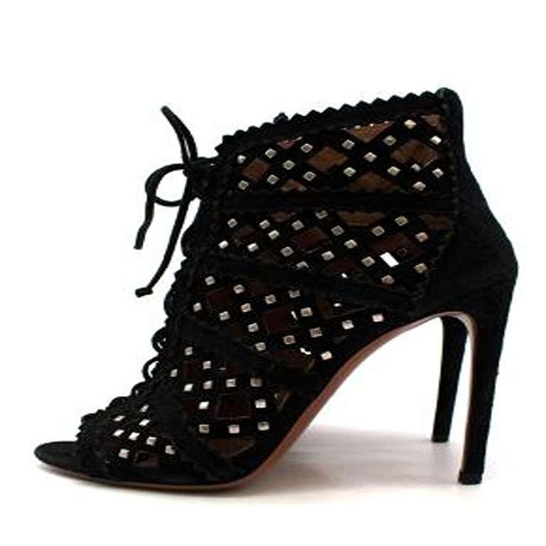 Alaia black laser-cut suede studded heeled booties For Sale at 1stDibs
