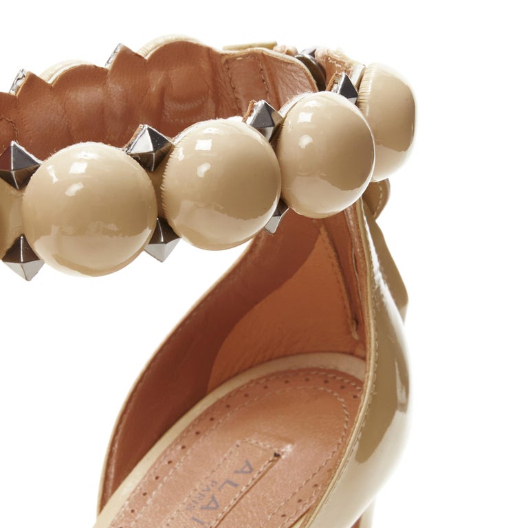 ALAIA La Bombe ball embellished studded nude patent high heel sandal ...