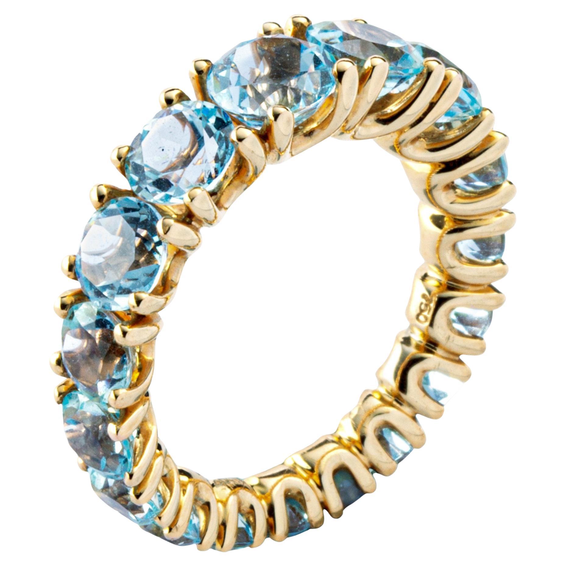 18 Karat White Gold Blue Topaz Eternity Ring For Sale at 1stDibs
