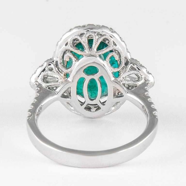 Alexander 8.50ct Oval Emerald with Diamond Three Stone Halo Ring 18 ...