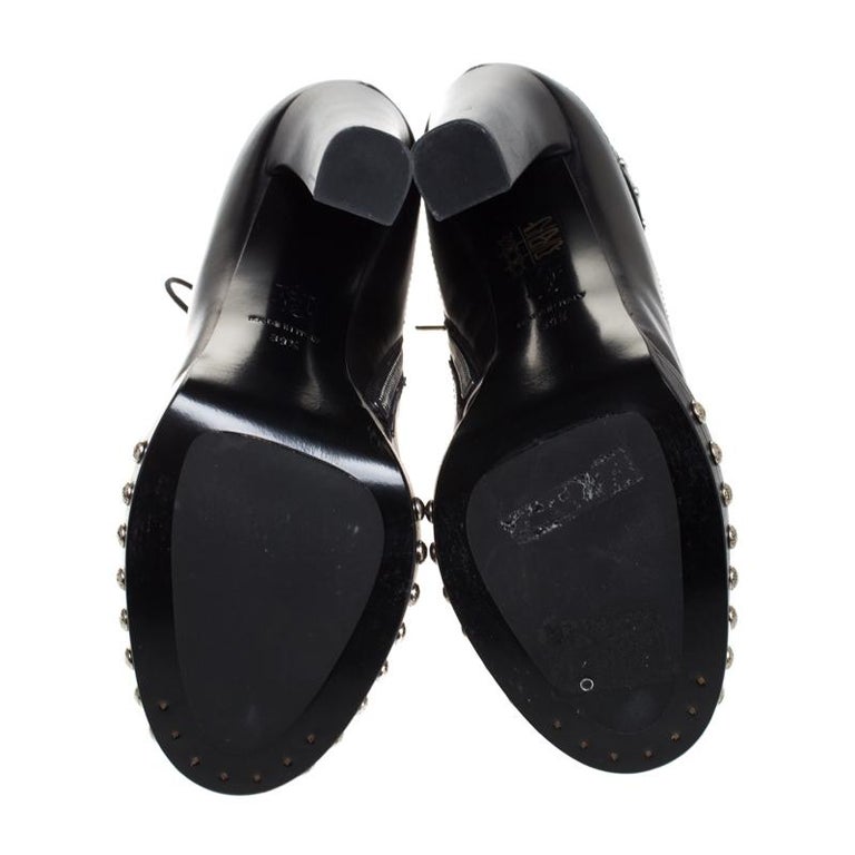 Alexander McQueen Black Leather Studded Ankle Boots Size 39.5 at 1stDibs
