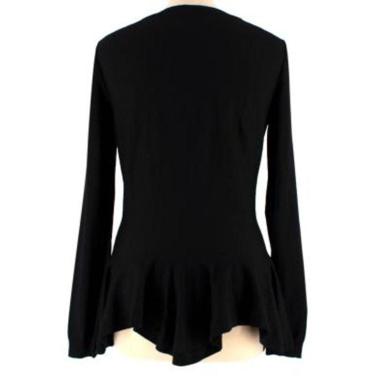 Alexander McQueen Black Wool Knit Peplum Hem Top For Sale at 1stDibs