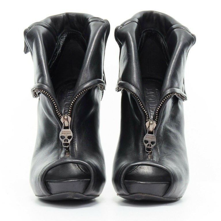 ALEXANDER MCQUEEN Faithful black leather skull zip biker peeptoe bootie ...