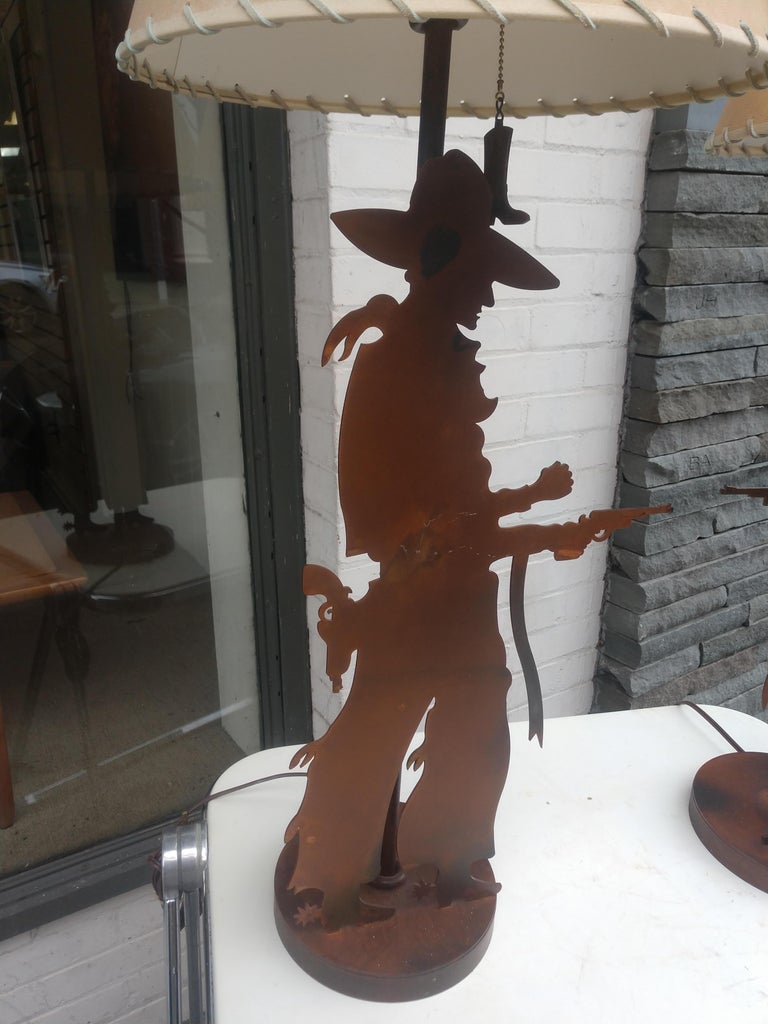 American Wild West Standoff Cowboy and Cowgirl Table Lamps For Sale at ...