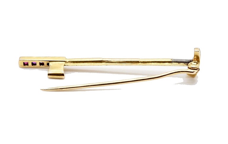 18 Kt Yellow and White Gold and Ruby Tie Pin in the Form of a Polo ...