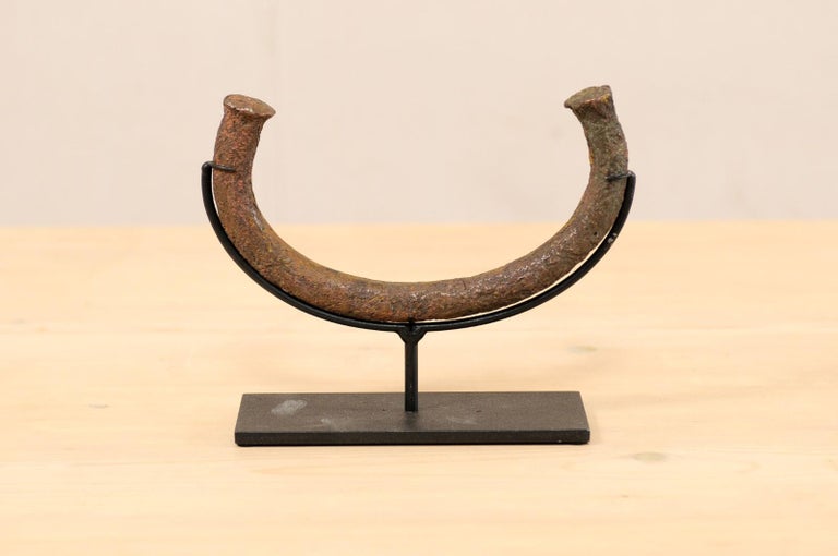 An African Manilla Trade Currency on Custom Iron Stand at 1stDibs