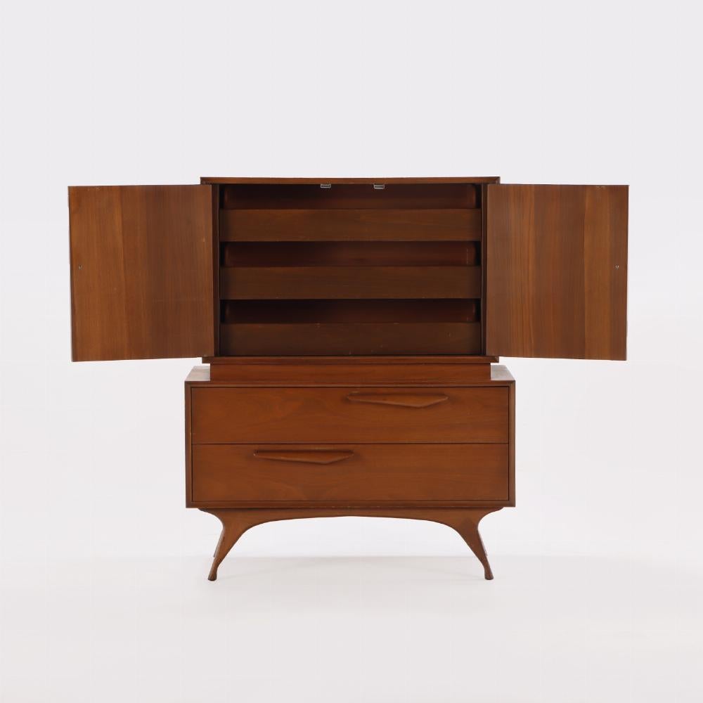 An Albert Parvin style mid century modern walnut highboy dresser. For ...