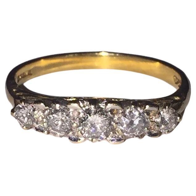 An Art-Deco Style 5-Stone Half-Hoop 0.65ct Diamond Ring. English ...