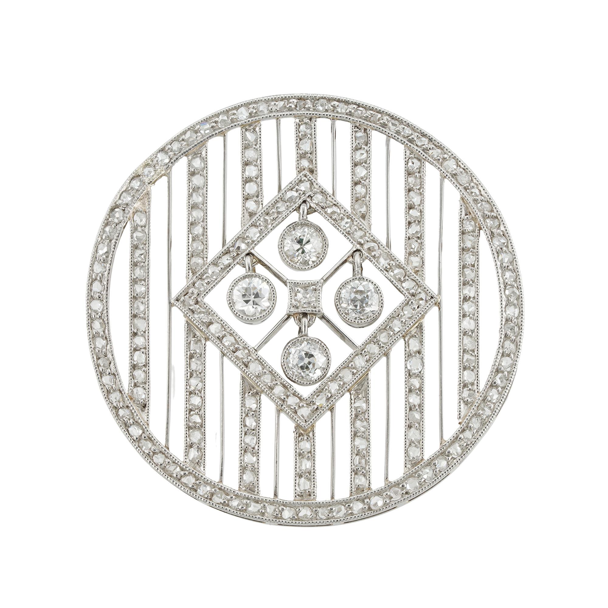 An Edwardian circular diamond brooch-pendant For Sale at 1stDibs