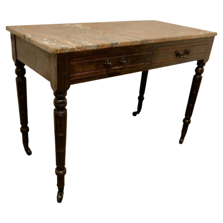 An Elegant Edwardian Pine Writing Table by Shoolbred For Sale at 1stDibs