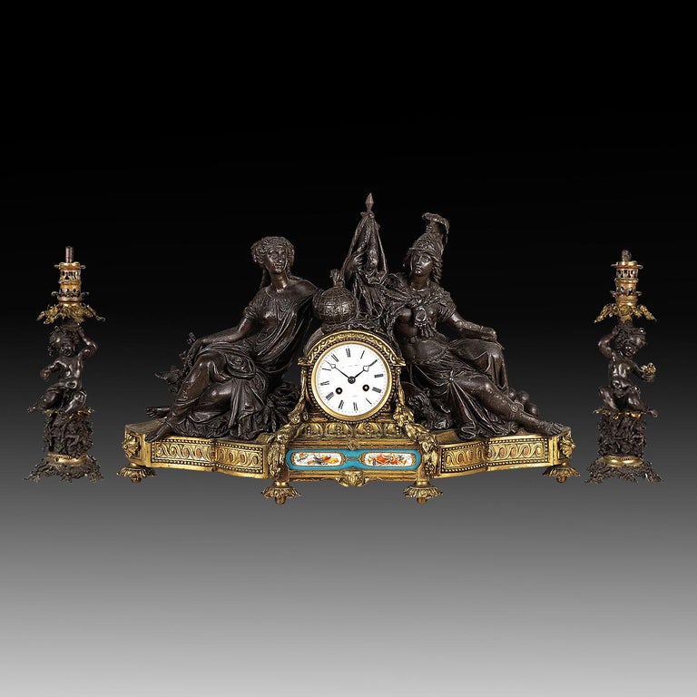 An Exceptional French Mid-19th Century Triptych Bronze Empire Mantel Clock For Sale at 1stDibs