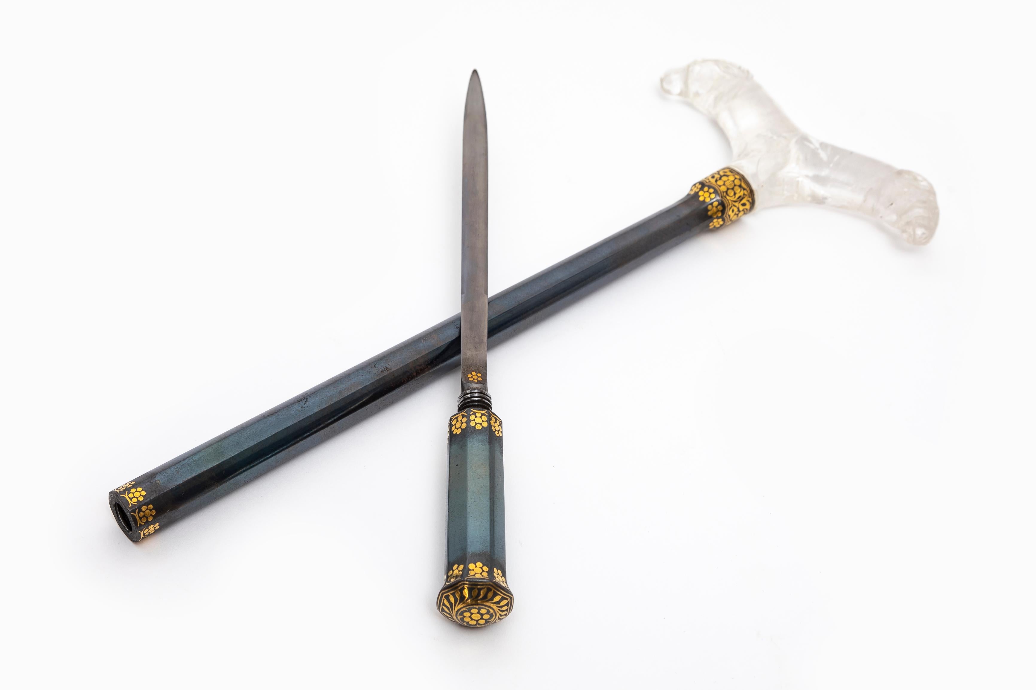 An Islamic/Mogul Blued Steel and Gold Inlay Rock Crystal Rams Head ...