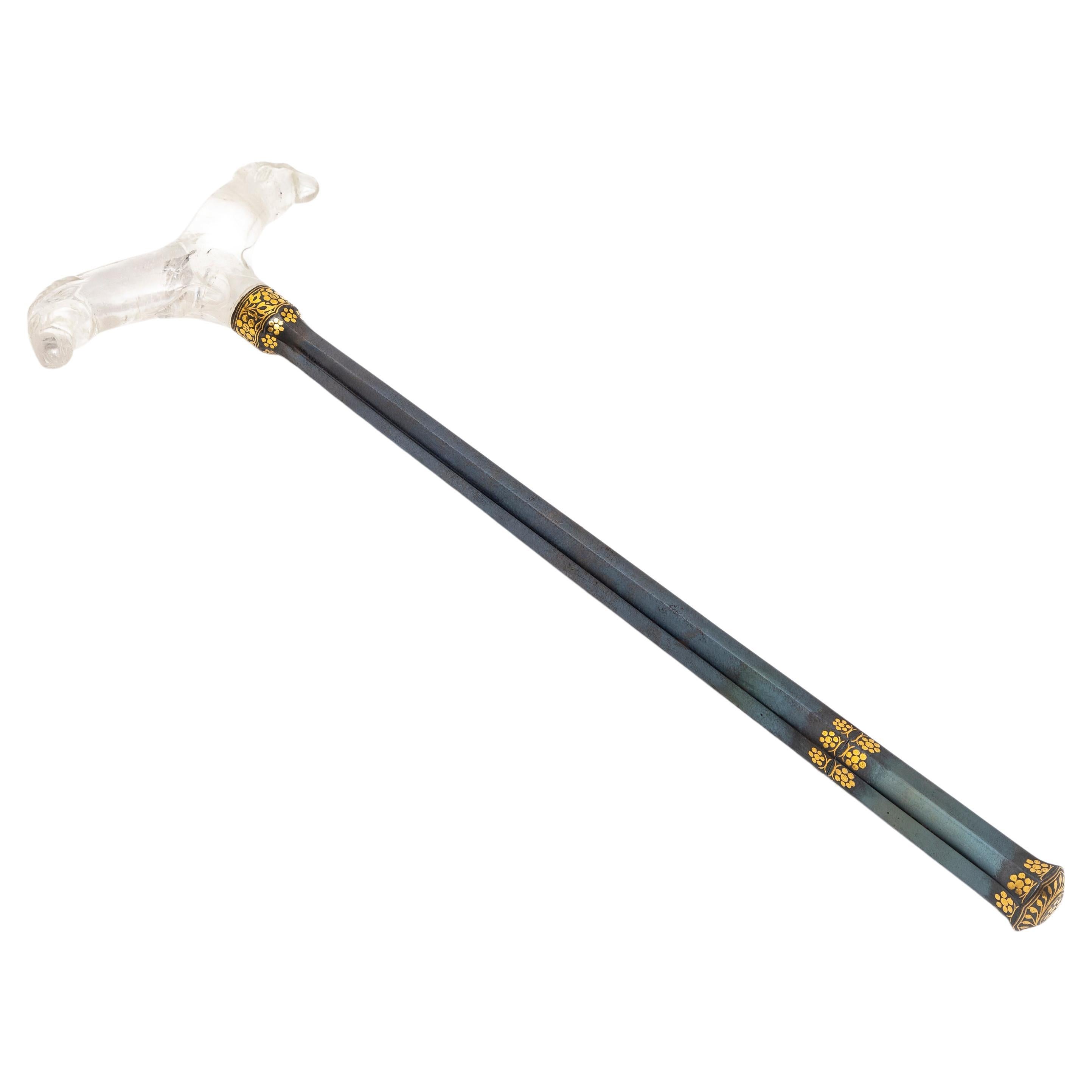 An Islamic/Mogul Blued Steel and Gold Inlay Rock Crystal Rams Head ...