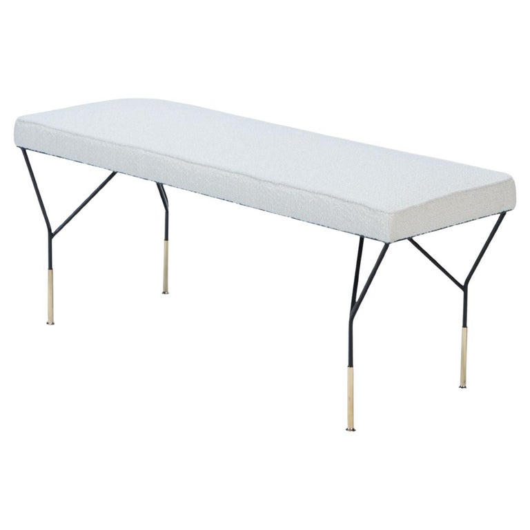 An Italian contemporary metal and brass bench with white upholstered ...
