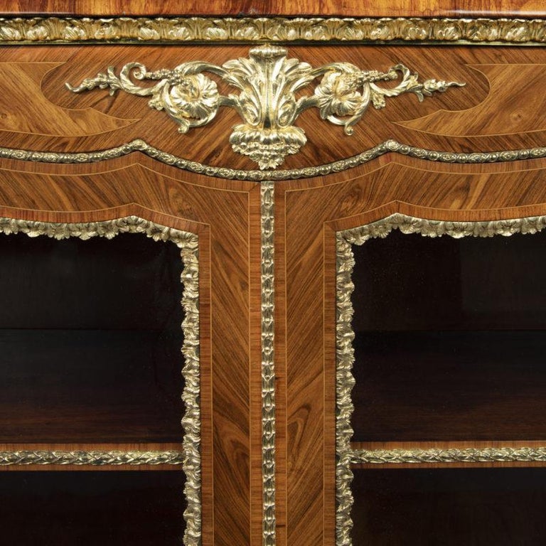 An ornate Victorian kingwood side cabinet in the French taste ...
