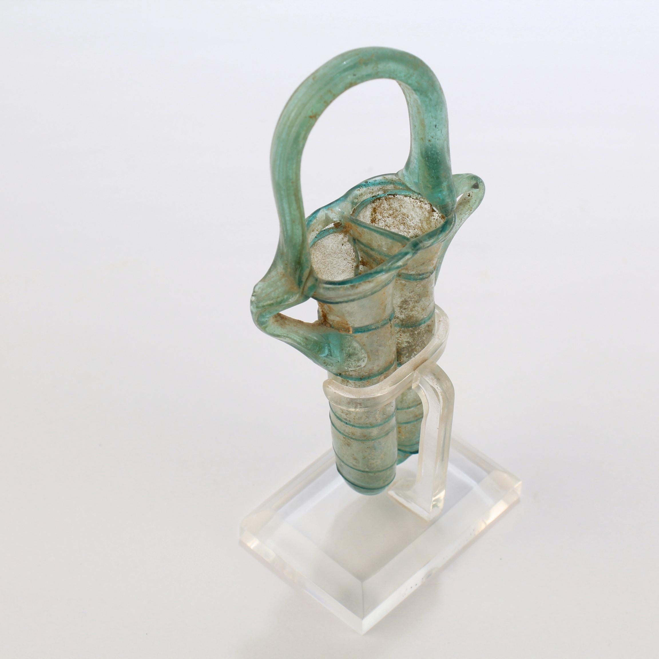 Ancient Roman Glass Double Unguentarium in Clear and Aqua Colored Glass ...