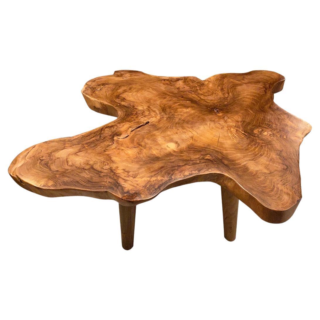 Free edge cyprus slab table with brass legs at 1stDibs