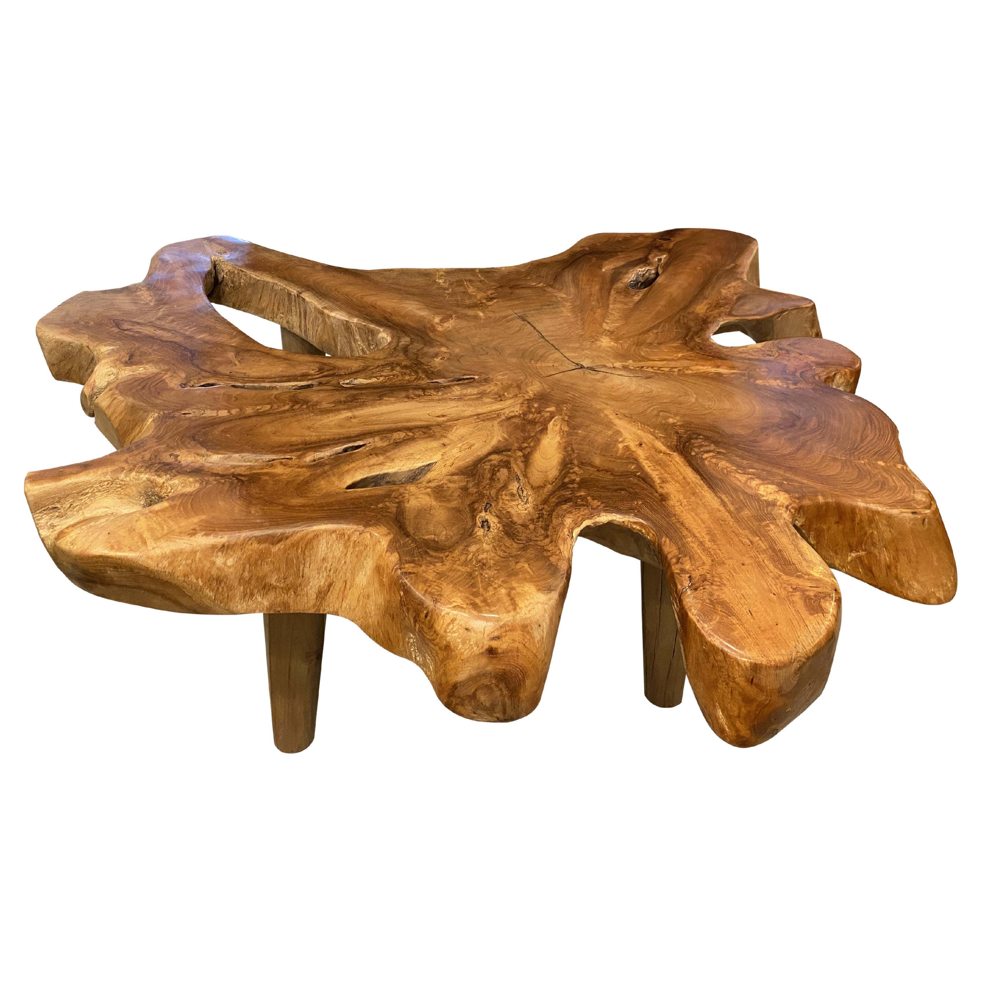 Free edge cyprus slab table with brass legs at 1stDibs