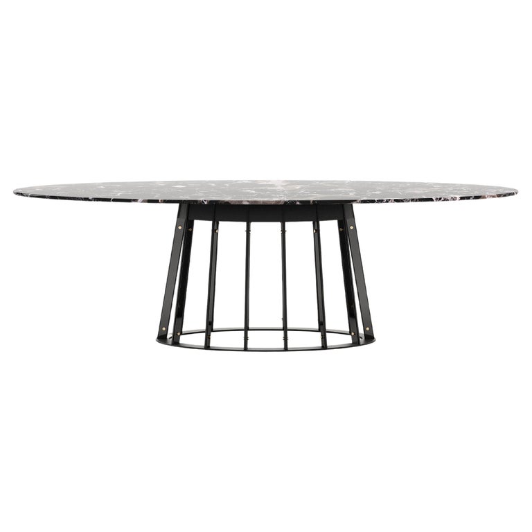 Contemporary oval dining table with metal tubular structure, fully ...