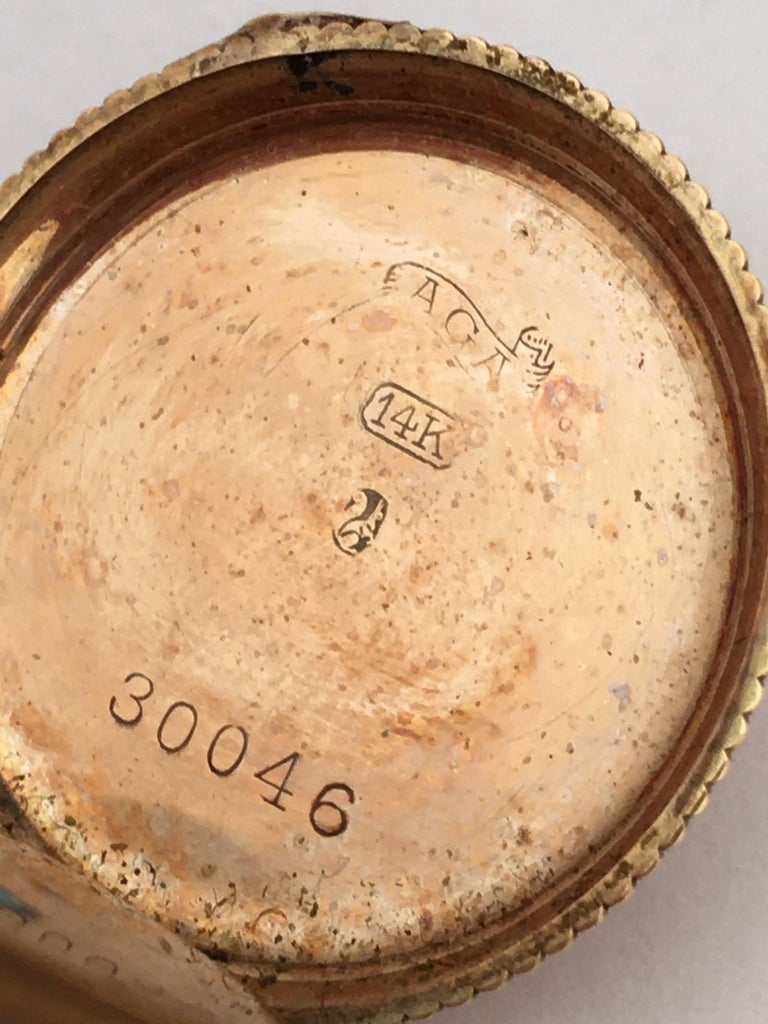 Antique 14 Karat Gold Engine Turned Case Key-Less Pendant Watch at 1stDibs