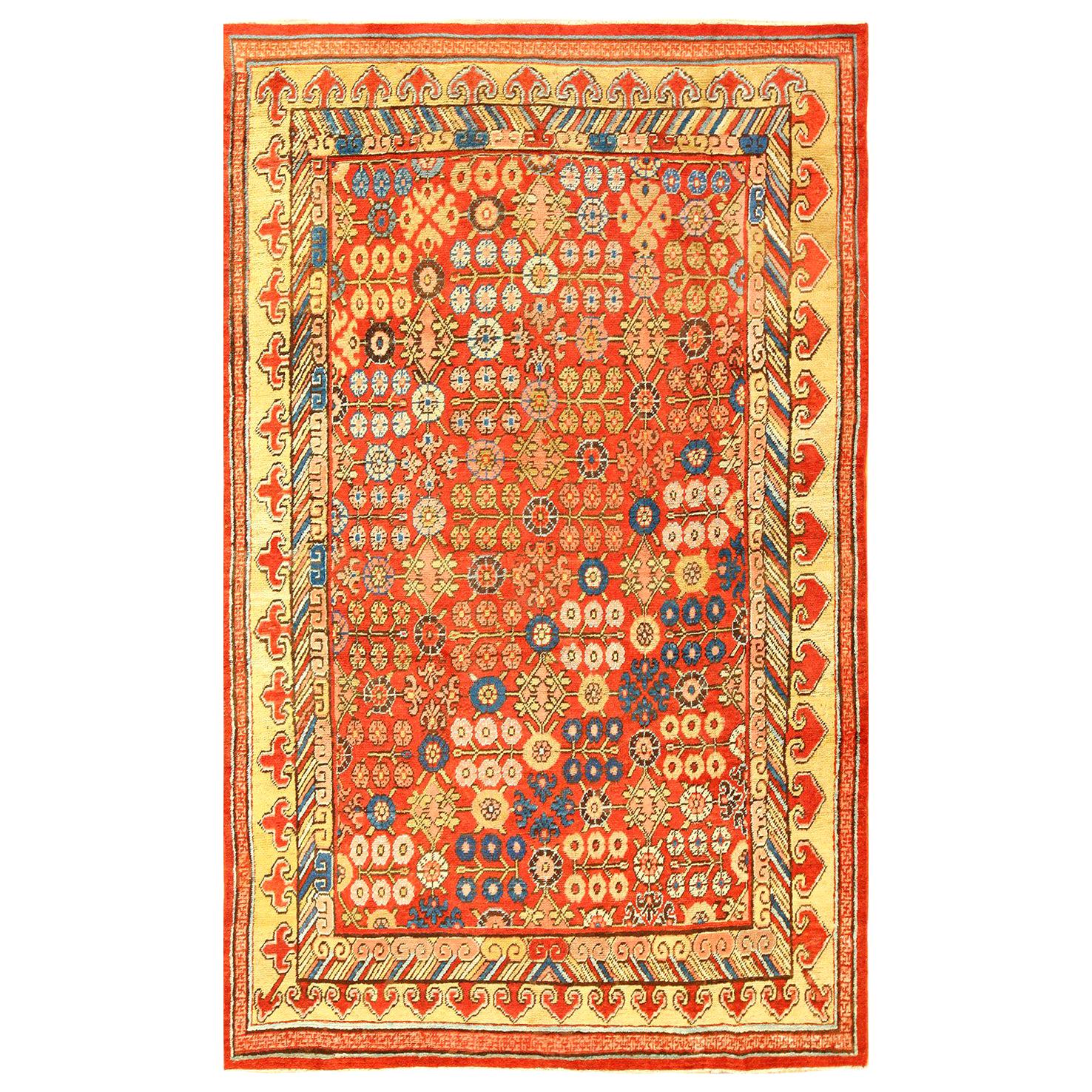 Antique 18th Century Pomegranate Design Khotan Rug. Size: 5 ft 6 in x 8 ...
