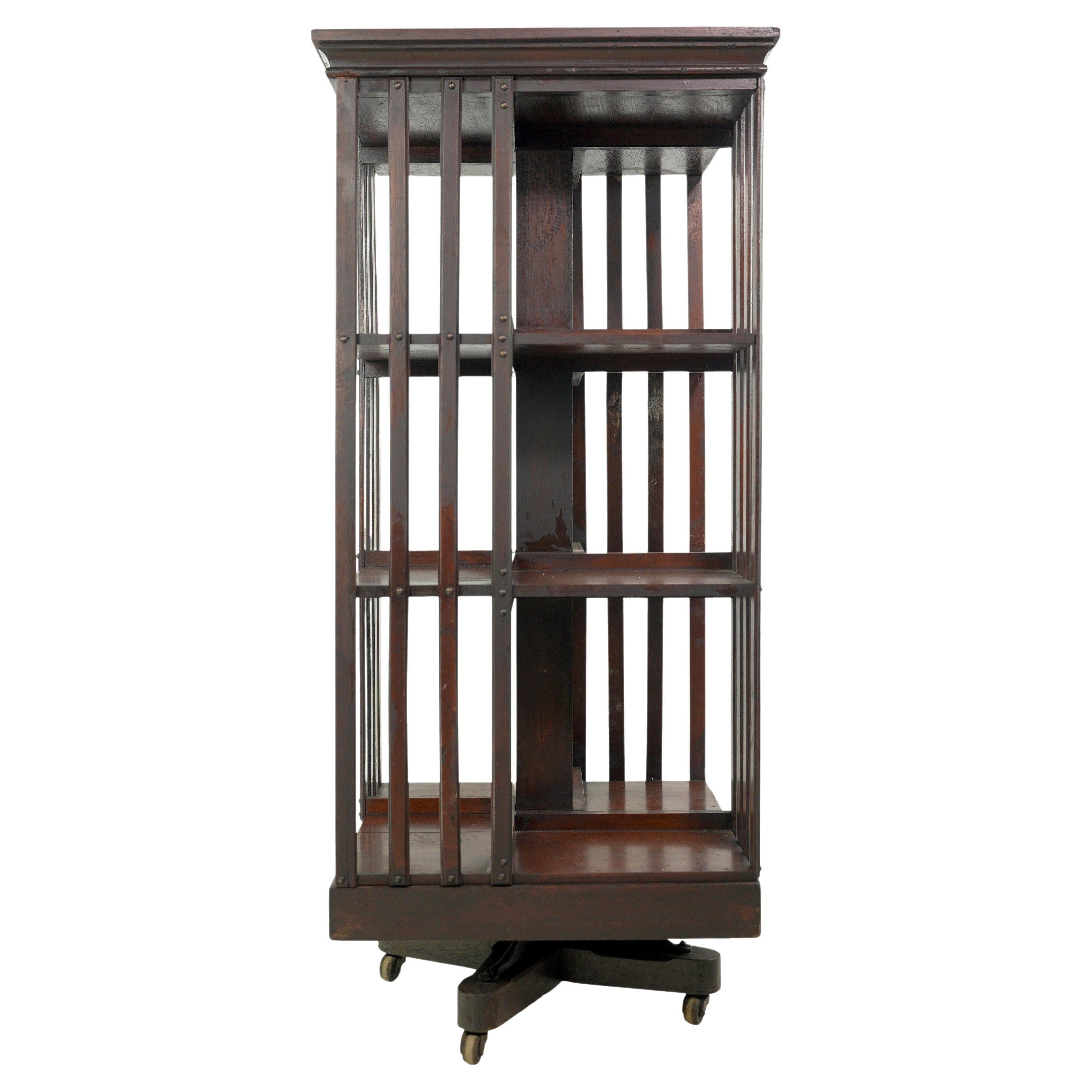 Walnut three tier revolving bookcase For Sale at 1stDibs