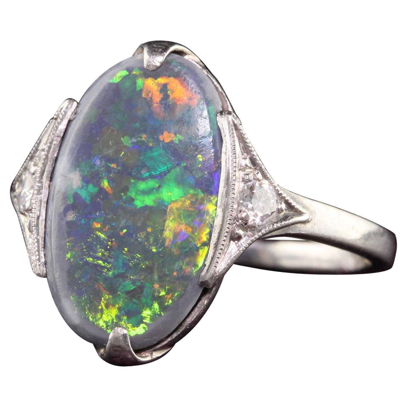 Art Deco Opal Ring with Diamonds and Demantoid Garnets at 1stDibs