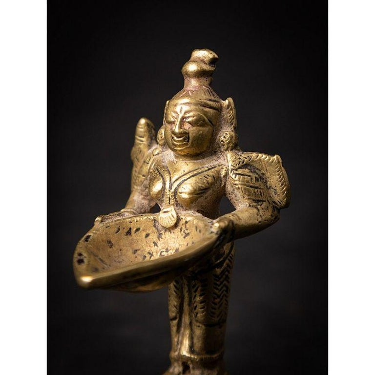 Antique Bronze Indian Lady Holding Oil Lamp from India For Sale at 1stDibs