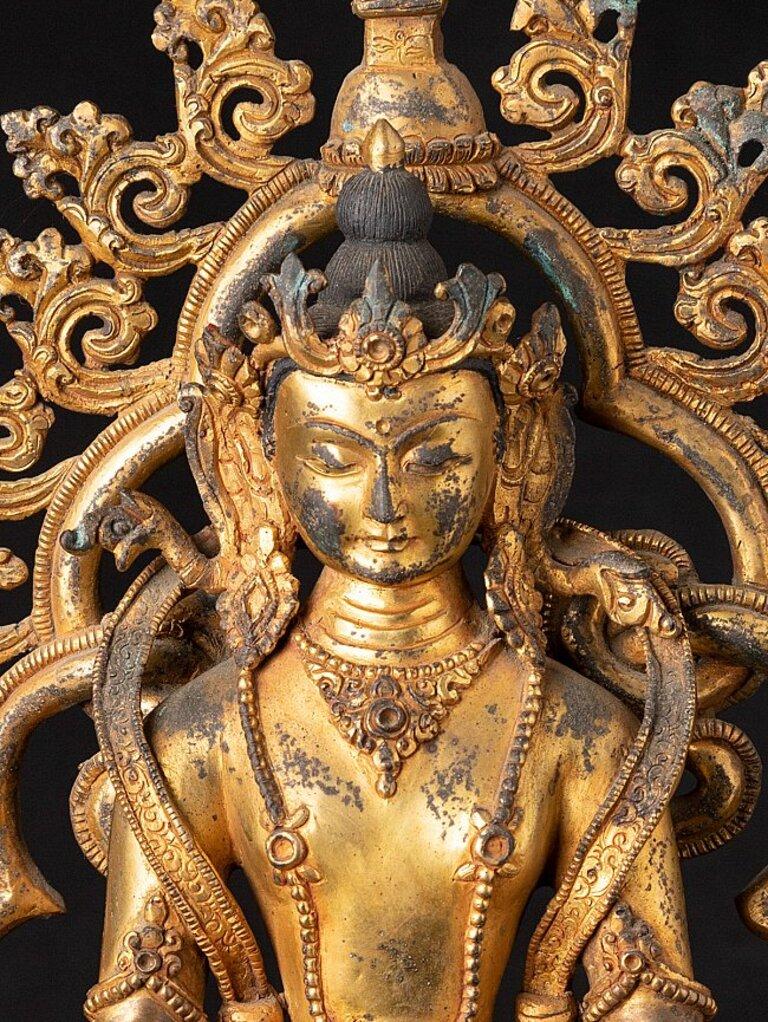 Antique bronze Nepali Buddha statue from Nepal For Sale at 1stDibs