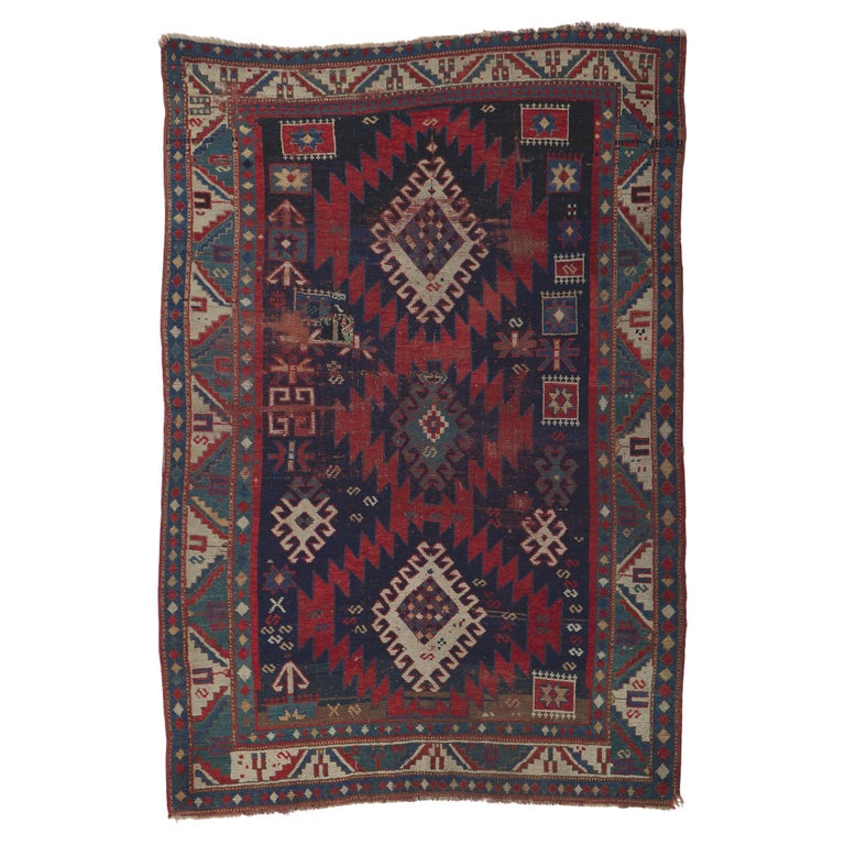 Antique Caucasian Kazak Rug with Tribal Style For Sale at 1stDibs