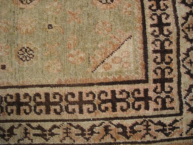 Antique Chinese Khotan Rug For Sale at 1stDibs