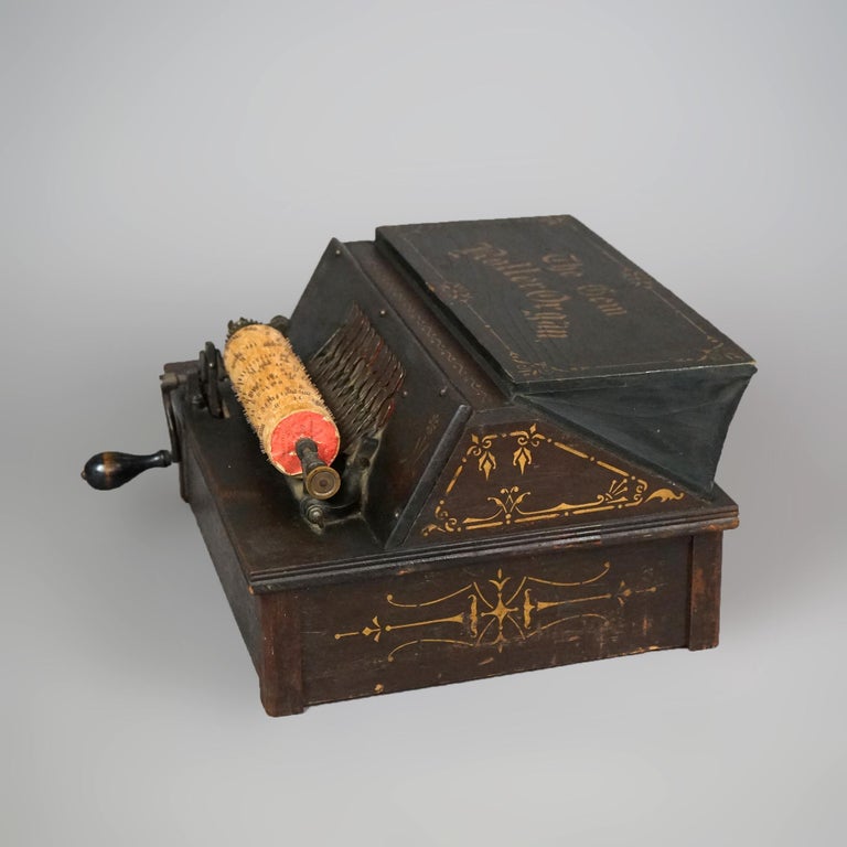 Antique Ebonized and Gilt Decorated Roller Organ with Rolls, the Gem ...