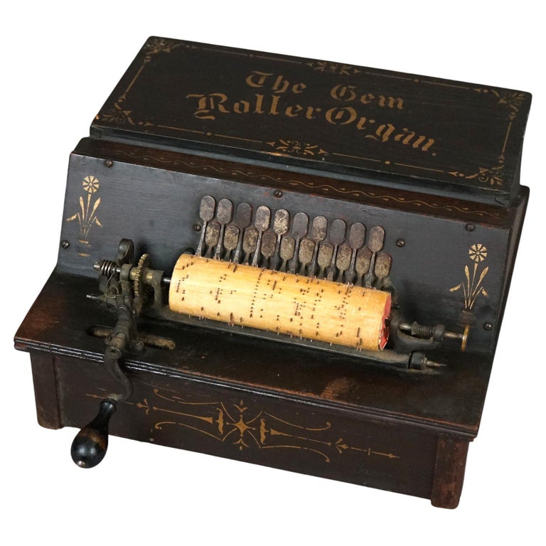 Antique Ebonized and Gilt Decorated Roller Organ with Rolls, the Gem ...