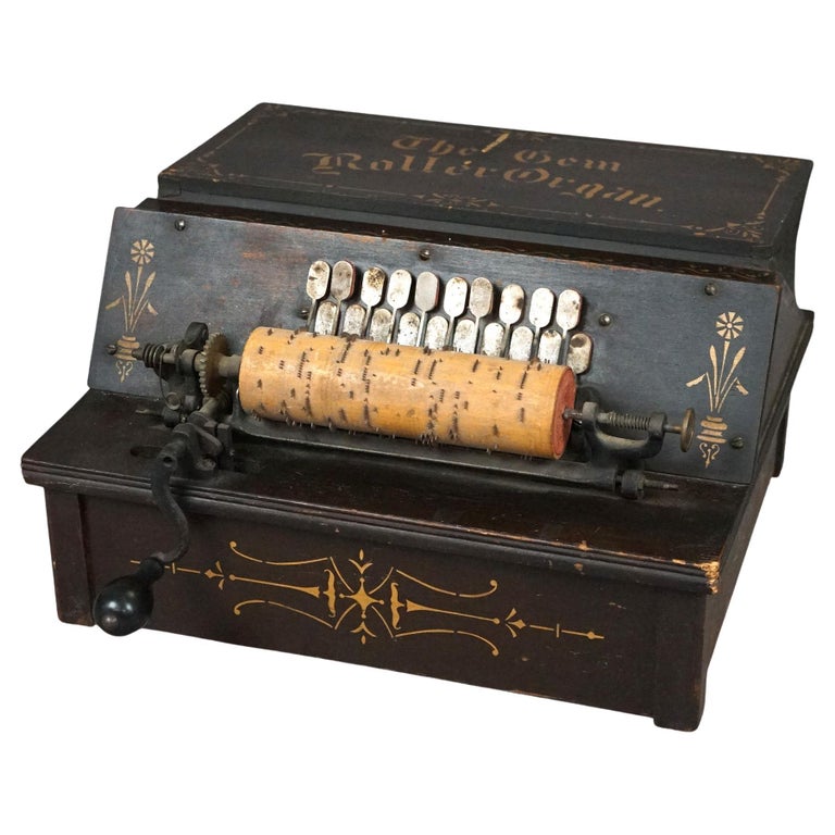 Antique Ebonized and Gilt Decorated Roller Organ with Rolls, the Gem ...