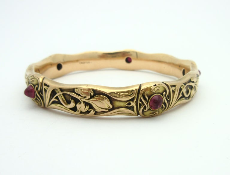 Antique EM Gattle Ruby Iris Repoussé Art Nouveau Bangle at 1stDibs