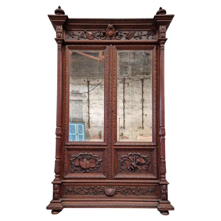 Antique French Armoire in Hand Carved Walnut For Sale at 1stDibs