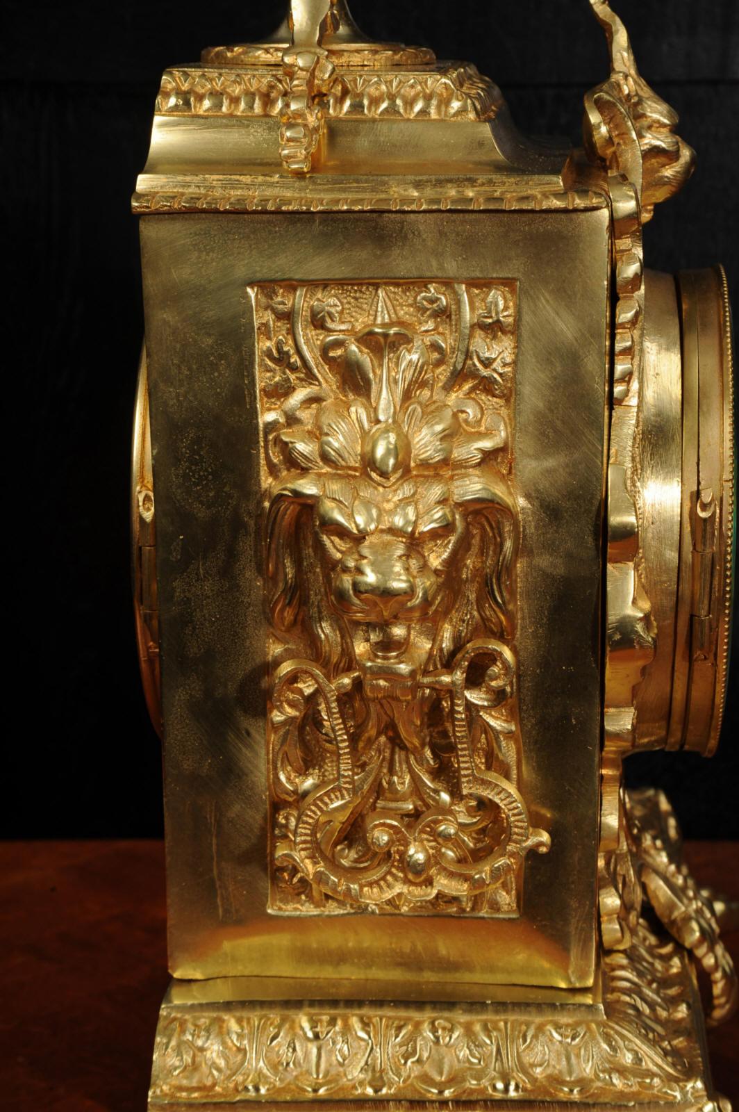 Antique French Baroque Gilt Bronze Clock, Lions Masks For Sale at 1stDibs