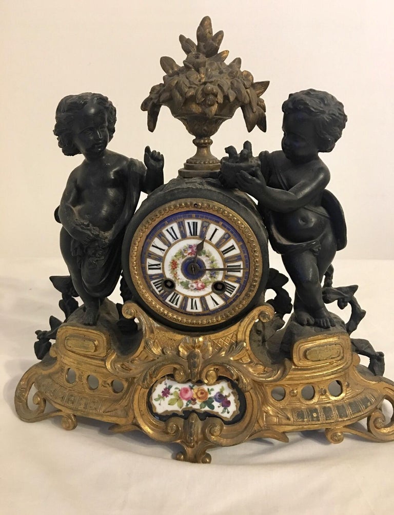 Antique French Ormolu Cherub Striking Mantel Clock For Sale at 1stDibs