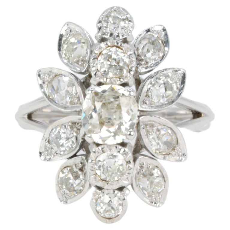 Antique gold, platinum and diamond ring with a floral design For Sale ...