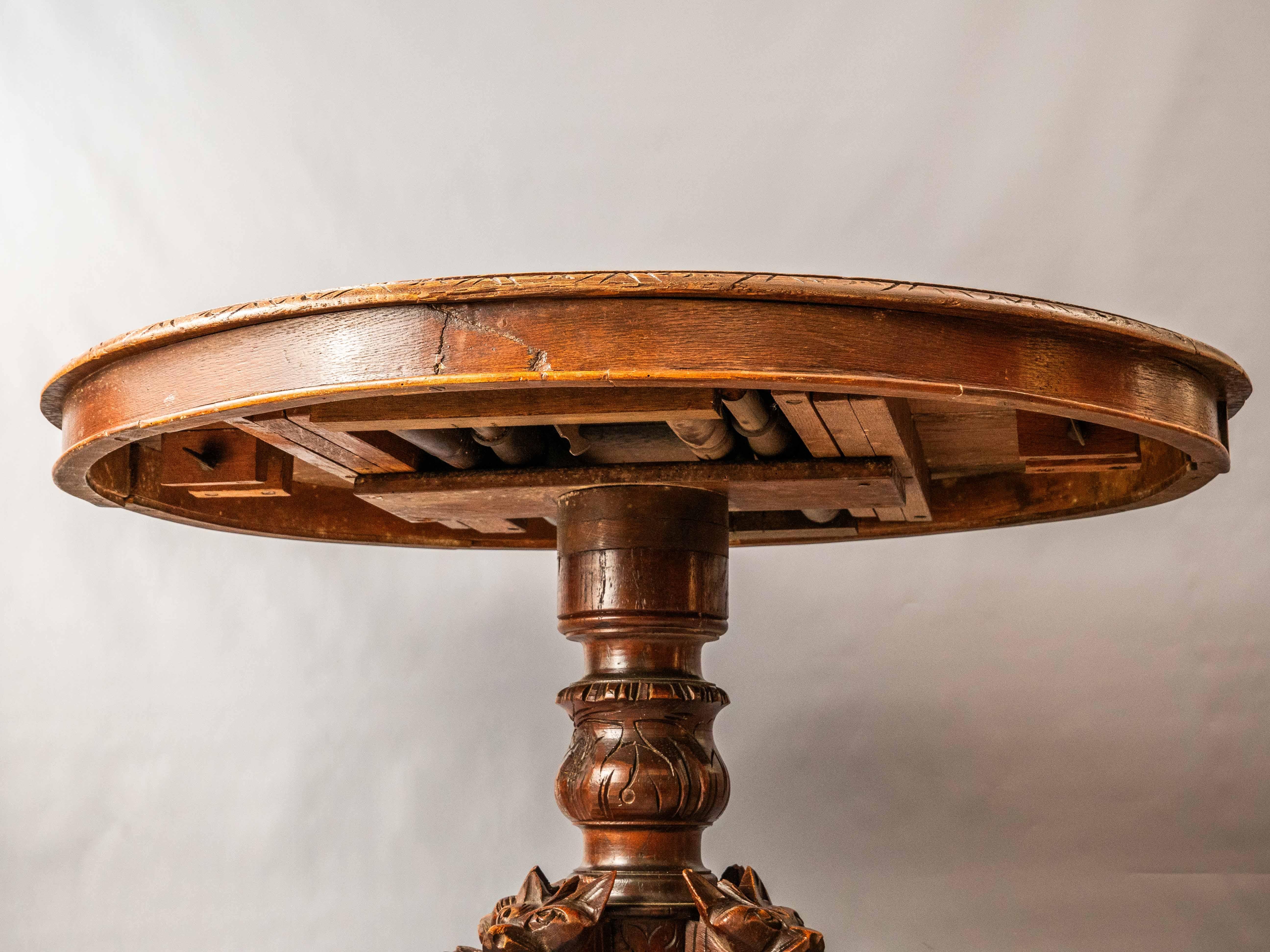 Antique hunting table with carvings, round, folding For Sale at 1stDibs