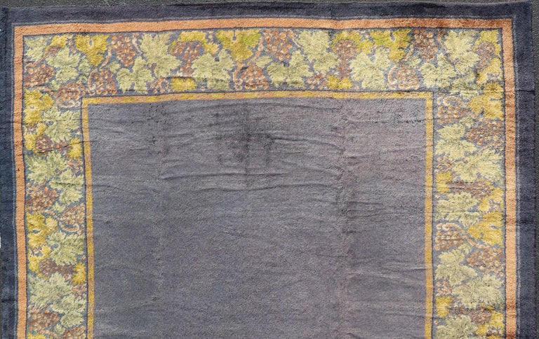 Antique Irish Donegal Carpet in solid Purple Background and Floral ...