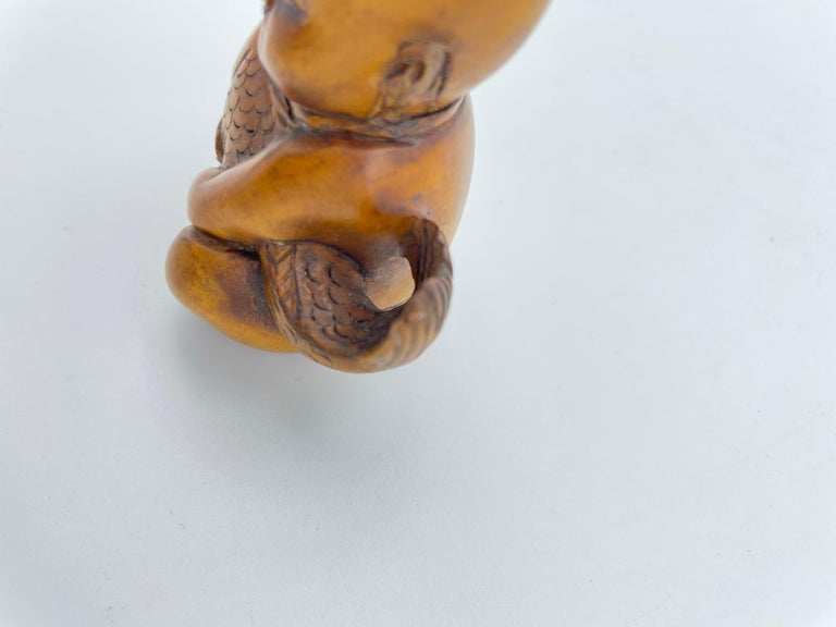 Antique Japanese Wooden Netsuke 'Boy with Fish' 1930s at 1stDibs