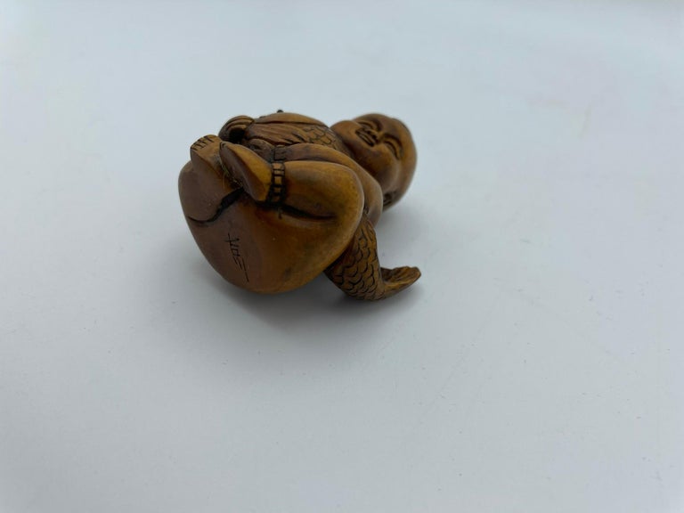 Antique Japanese Wooden Netsuke 'Boy with Fish' 1930s at 1stDibs