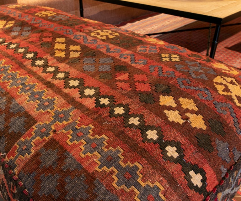 Antique Kilim Upholstered Pouffe with Four Wooden Legs and Brass ...