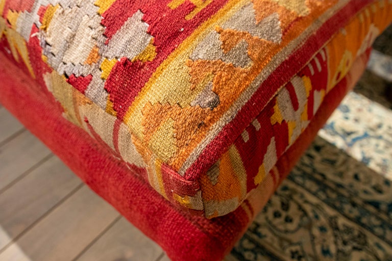 Antique Kilim Upholstered Pouffe with Four Wooden Legs and Brass ...